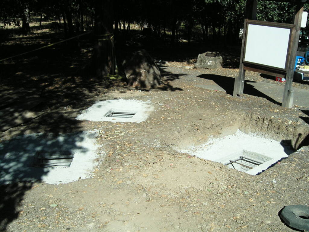 five separate plaques were part of a larger memorial to those buried in ...